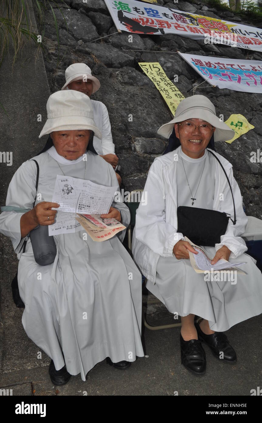 Okinawa, Japan: people protesting by Camp Schwab Marines base against ...