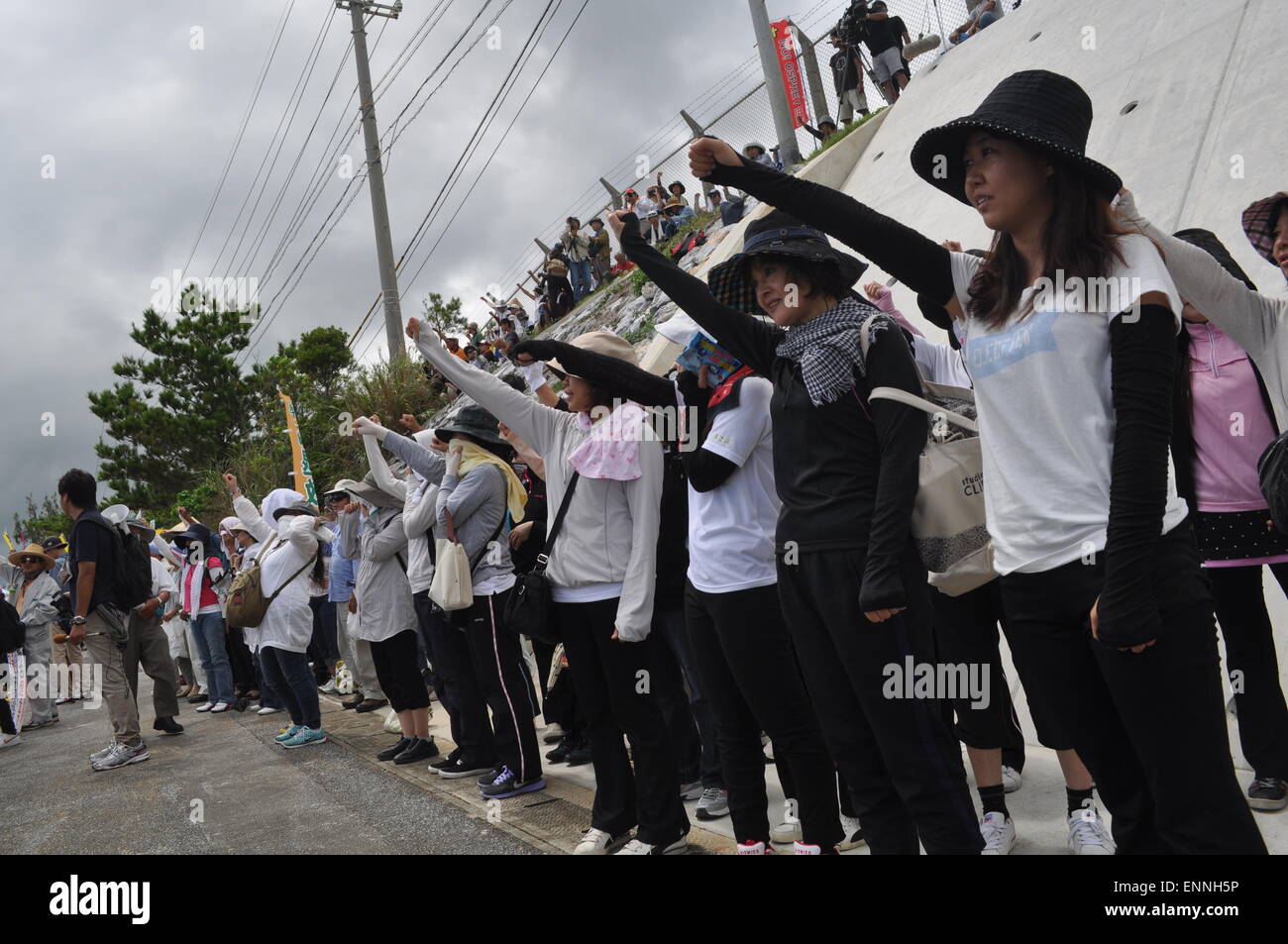 Okinawa, Japan: people protesting by Camp Schwab Marines base against ...