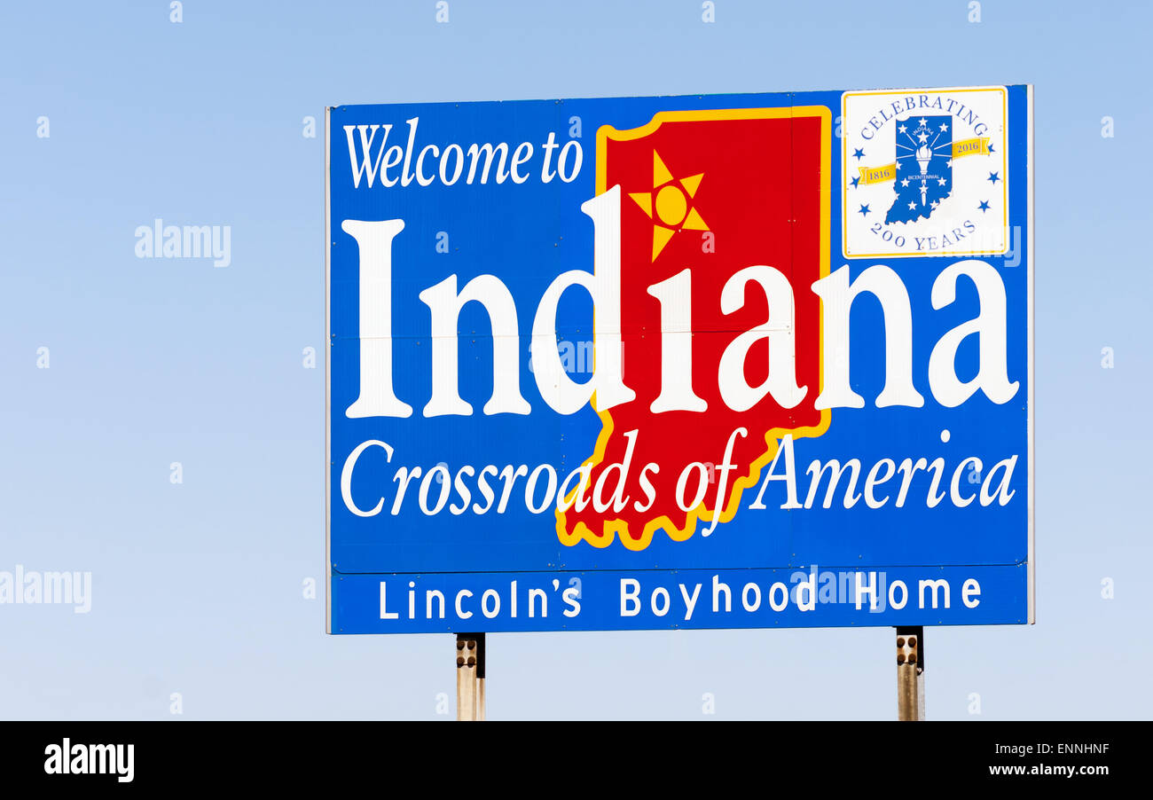 Blue sign against blue sky welcomes you to Indiana Stock Photo - Alamy