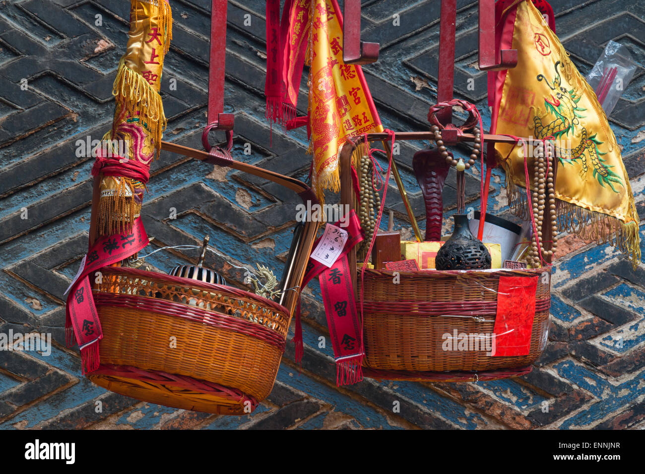 Two baskets of religious props hang in Chaotian Temple at the ...