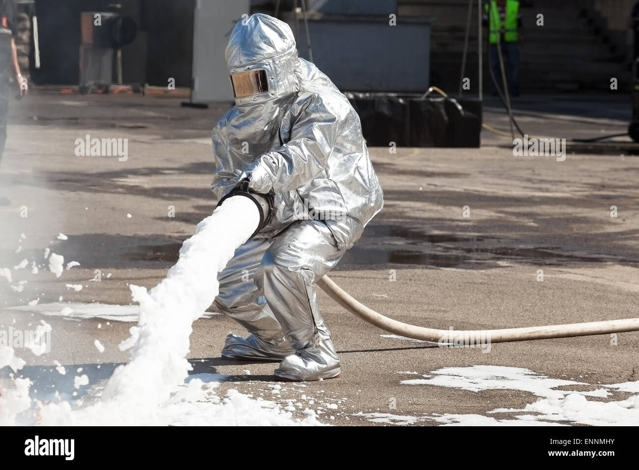 firefighter in action Stock Photo - Alamy