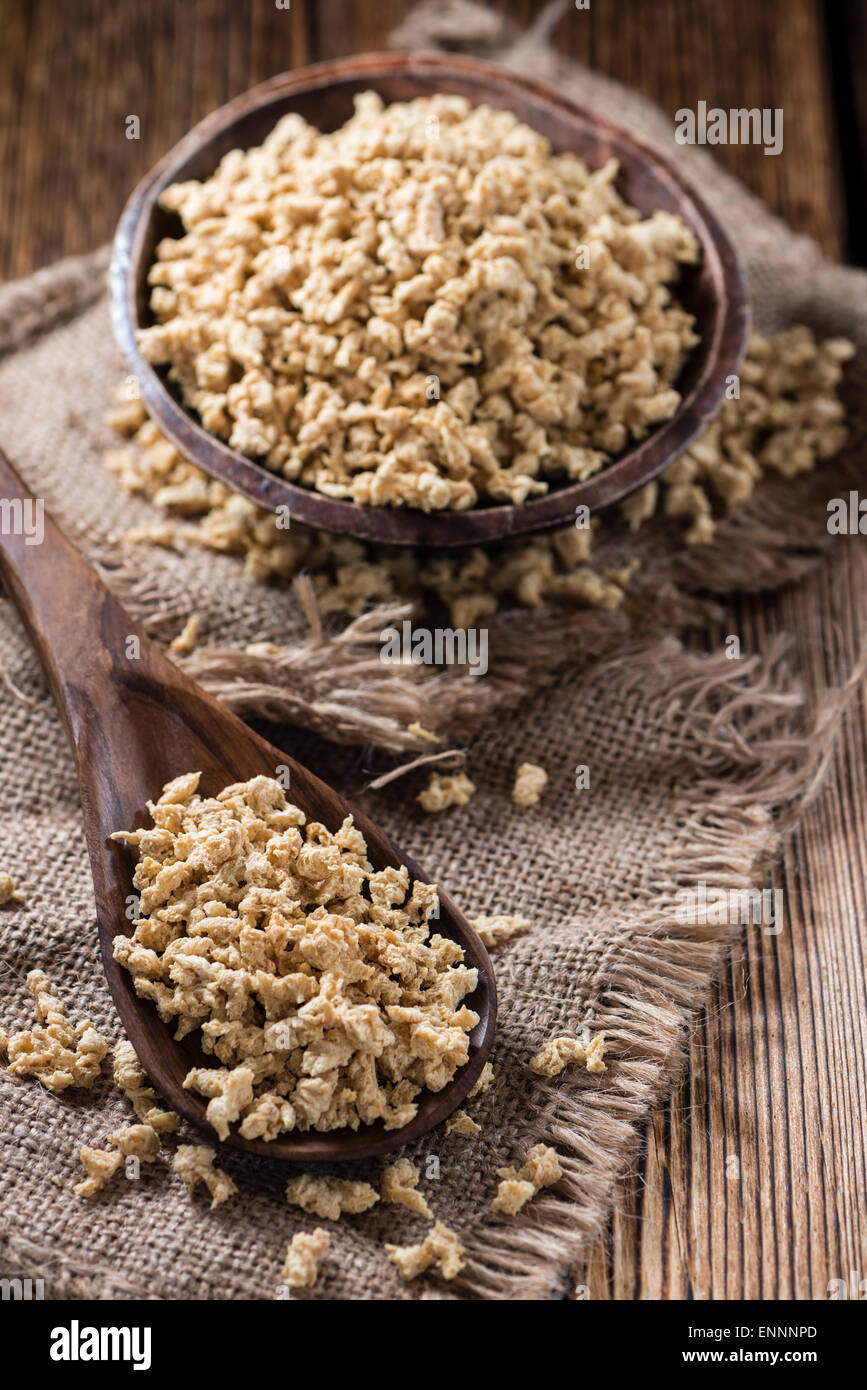 Dried Soy Meat (close-up shot) on wooden background Stock Photo - Alamy