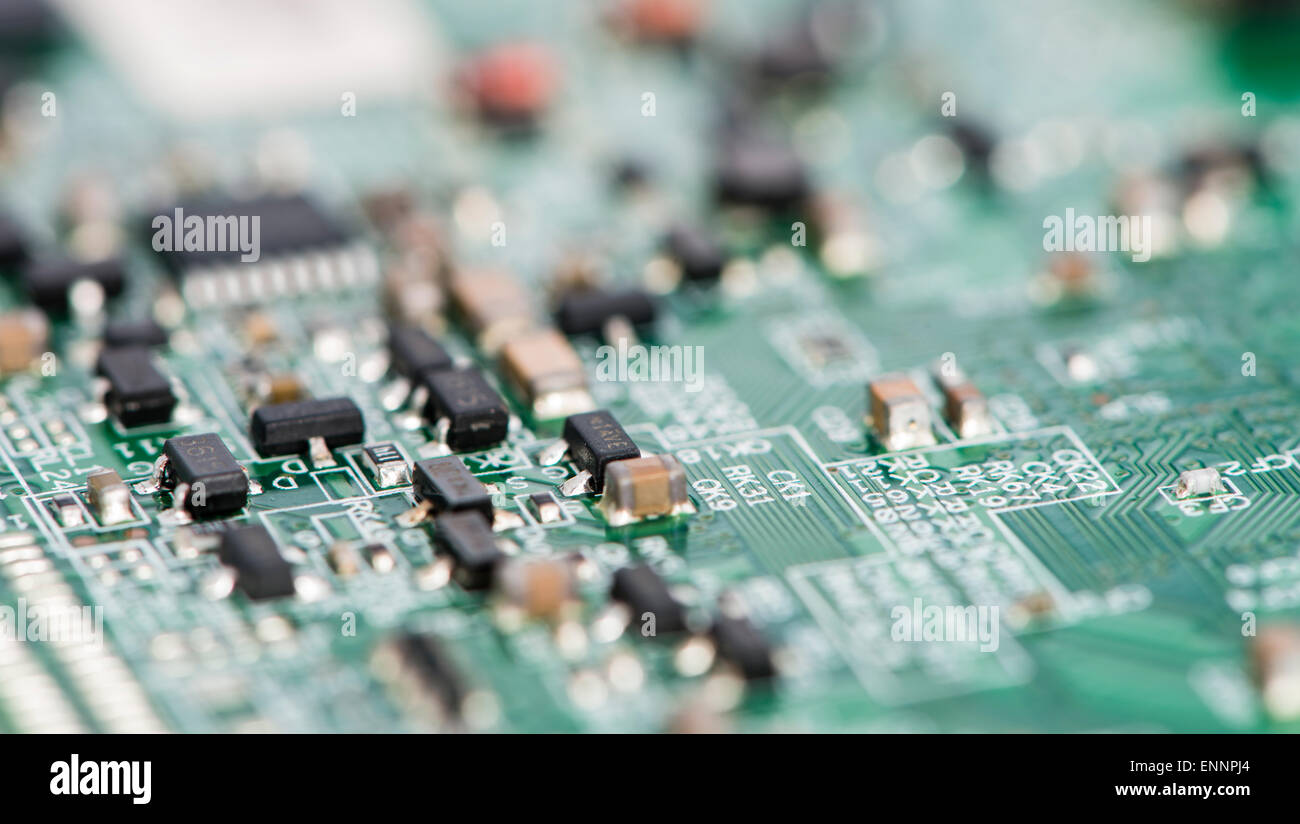 PCB (Printed Circuit Board) with different components Stock Photo - Alamy