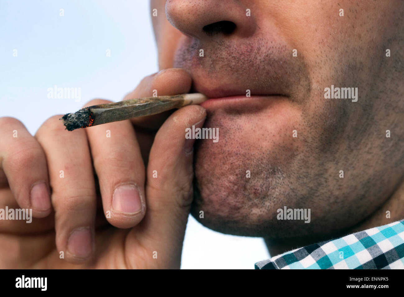 Detail smoker inhaling hi-res stock photography and images - Alamy