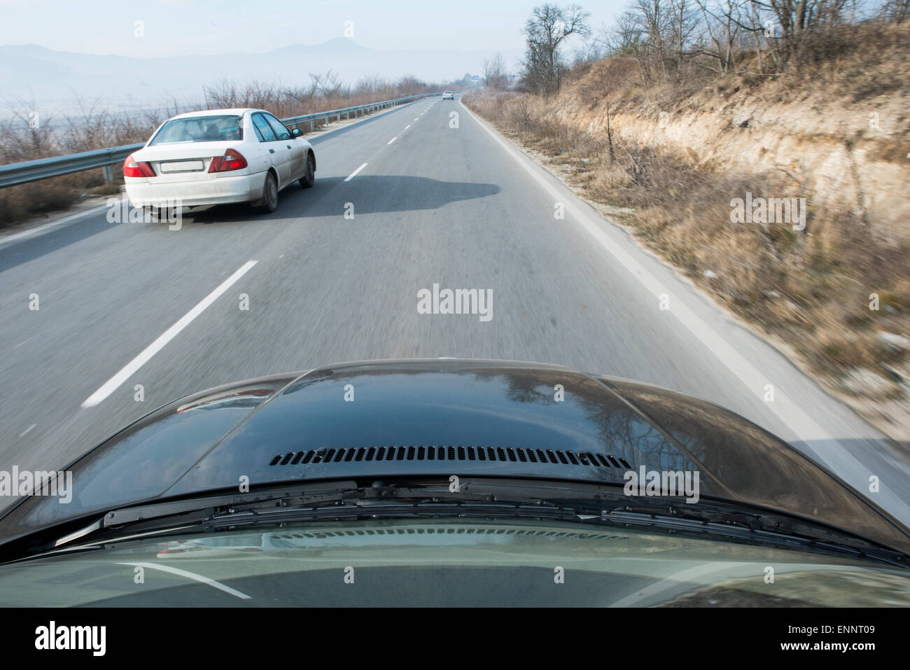 Moving cars on road in hi-res stock photography and images - Alamy