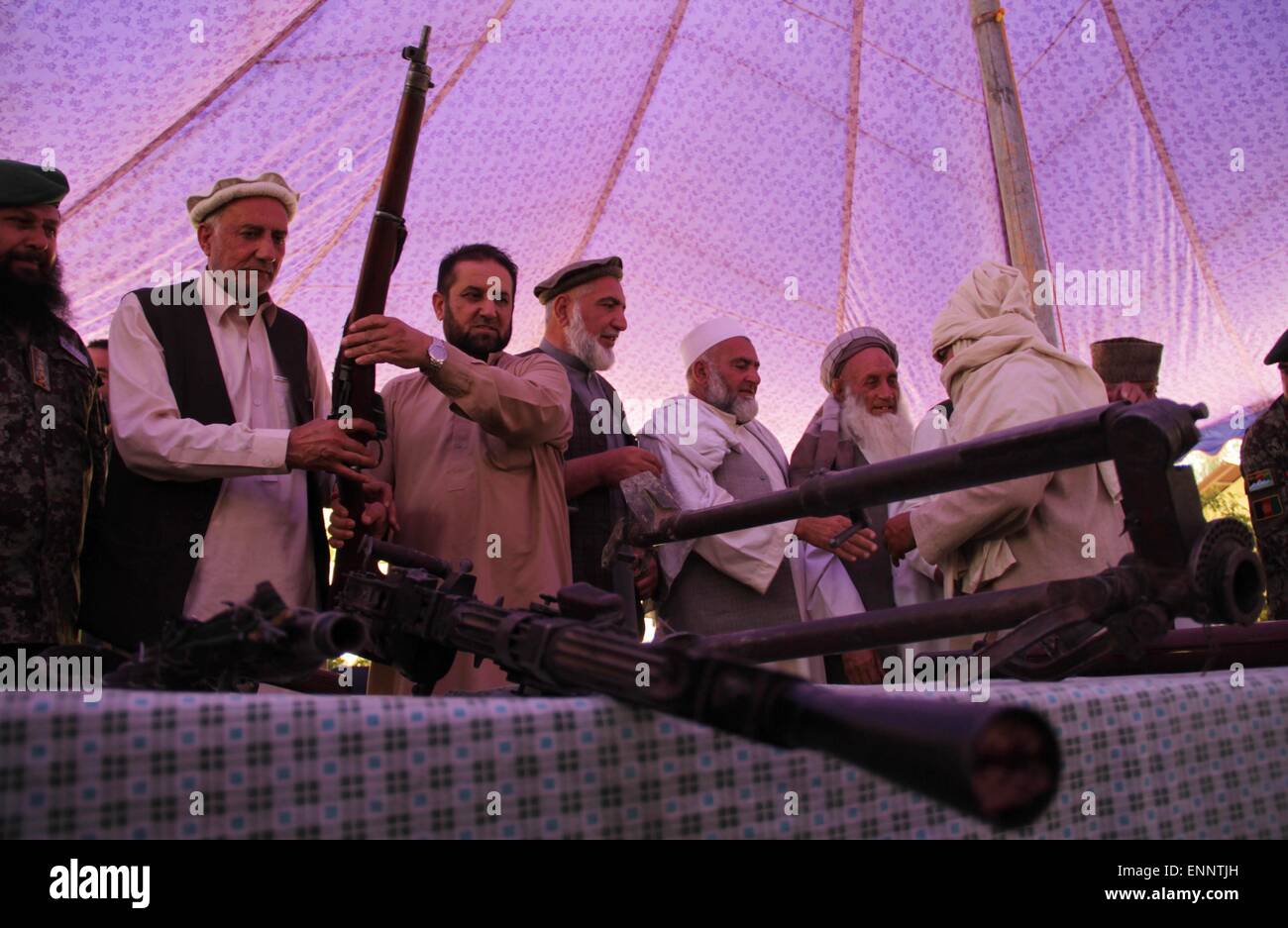 Nangarhar, Afghanistan. 9th May, 2015. Taliban fighters attend a ...