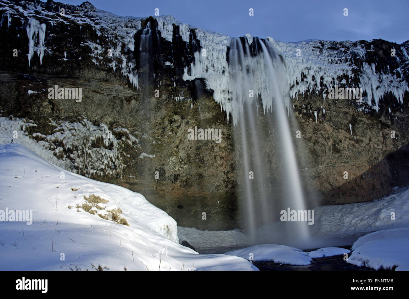 Seljalandsfoss waterfall at dawn in winter Stock Photo - Alamy