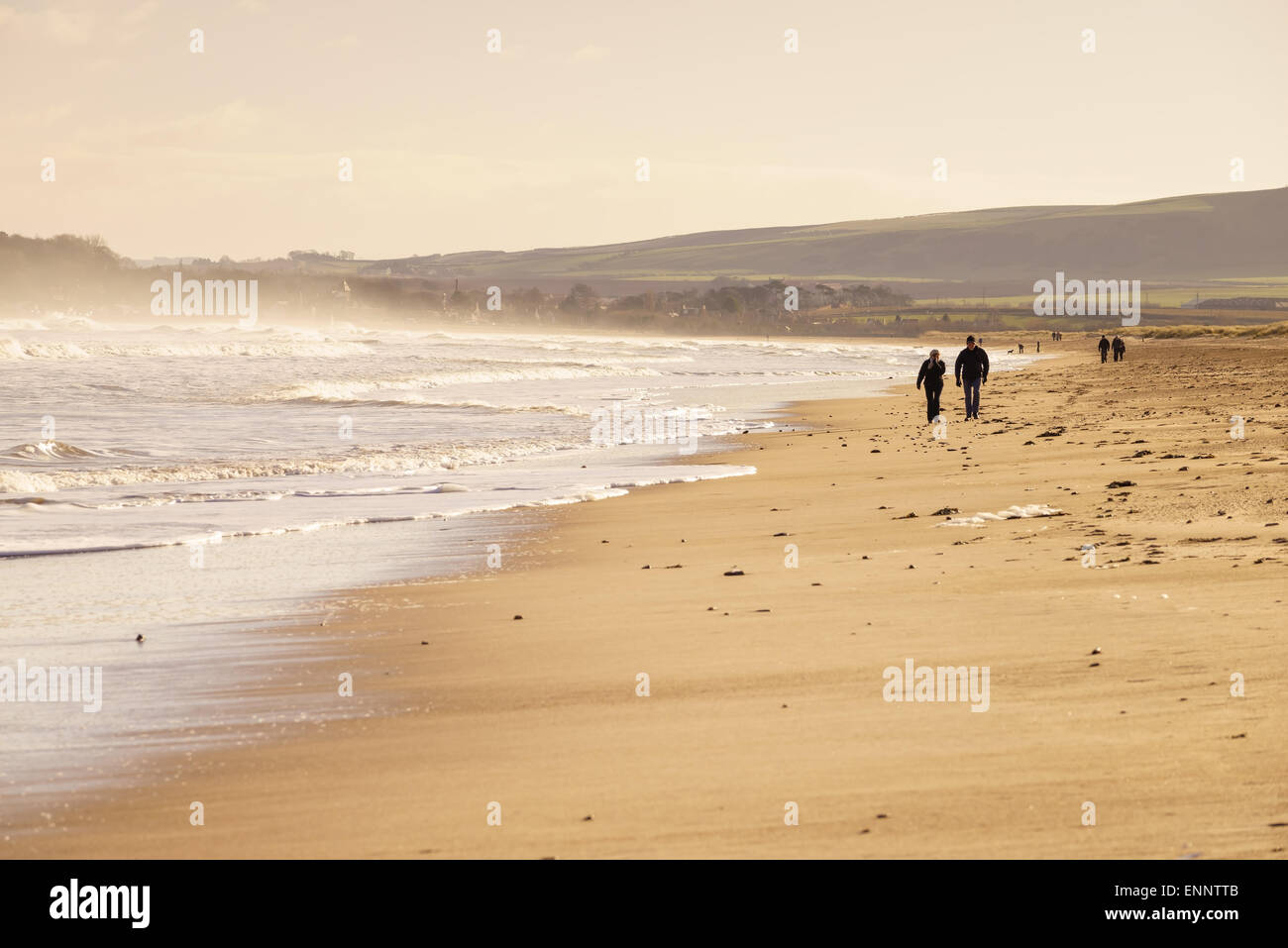 People walking on the beach at John Muir Country Park, Scotland Stock ...