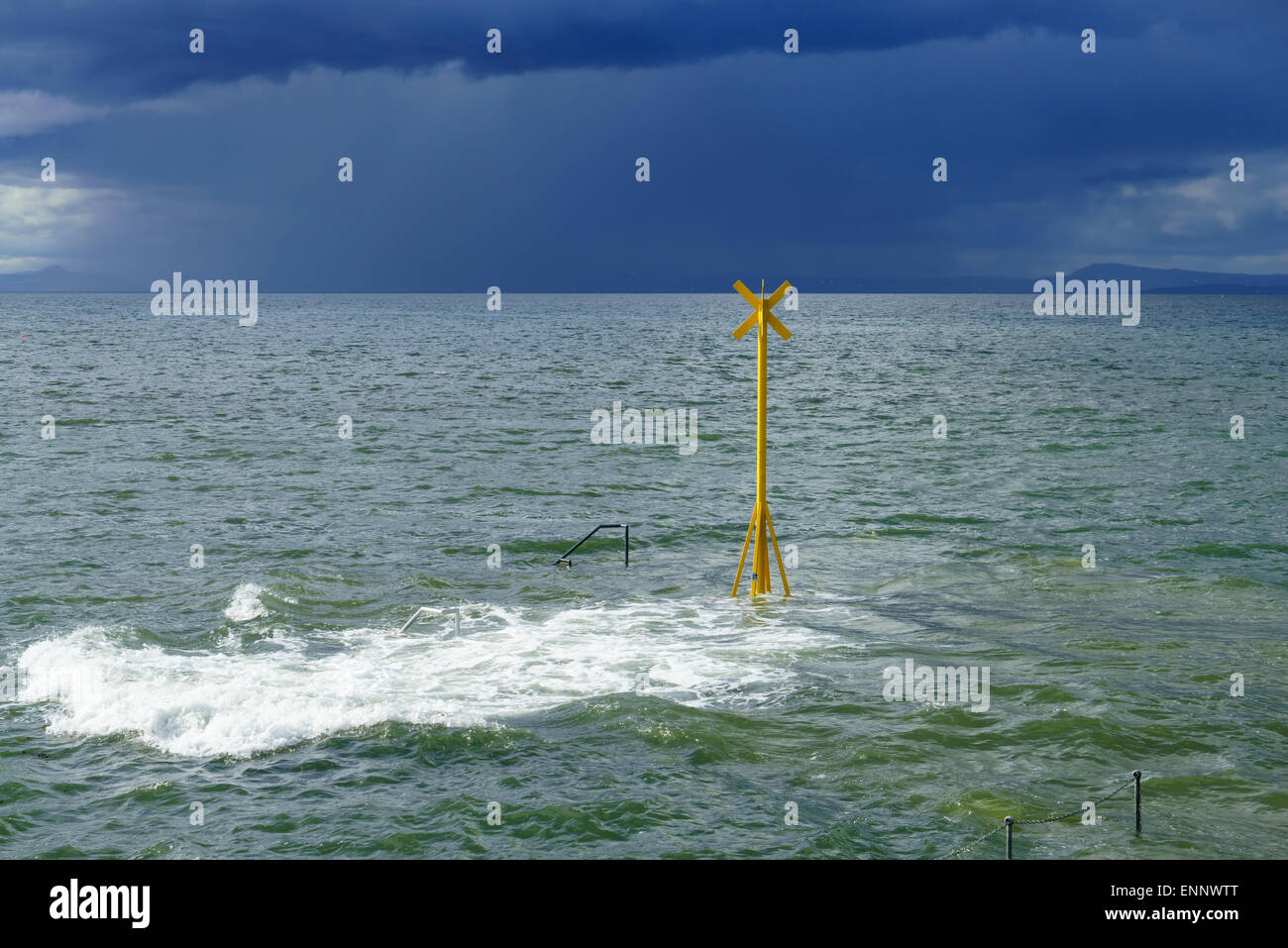 The flooded old pier at high tide in North Berwick, East Lothian ...