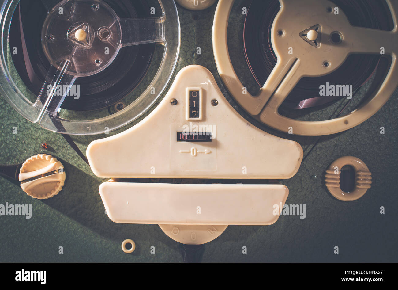 Old vintage green tape recorder on pink wall Stock Photo - Alamy