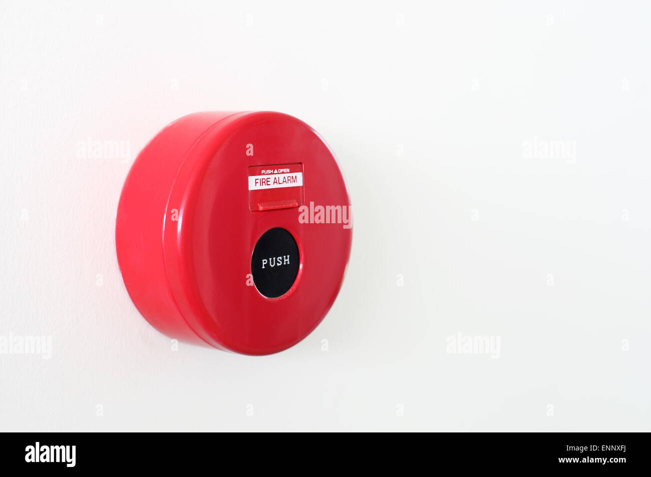 Fire alarm red circle box warning machine Stock Photo - Alamy