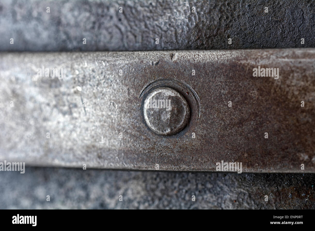 Metal rivet connecting metal plates Stock Photo - Alamy