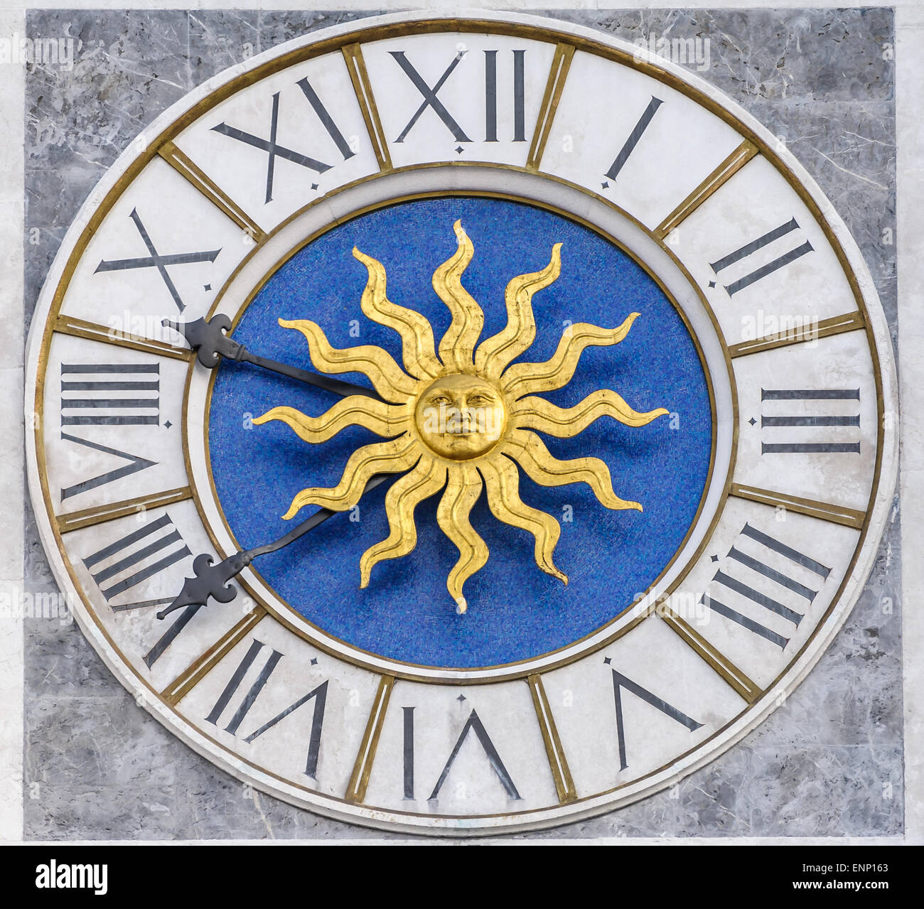 Clock tower with the sun in the square format Stock Photo - Alamy