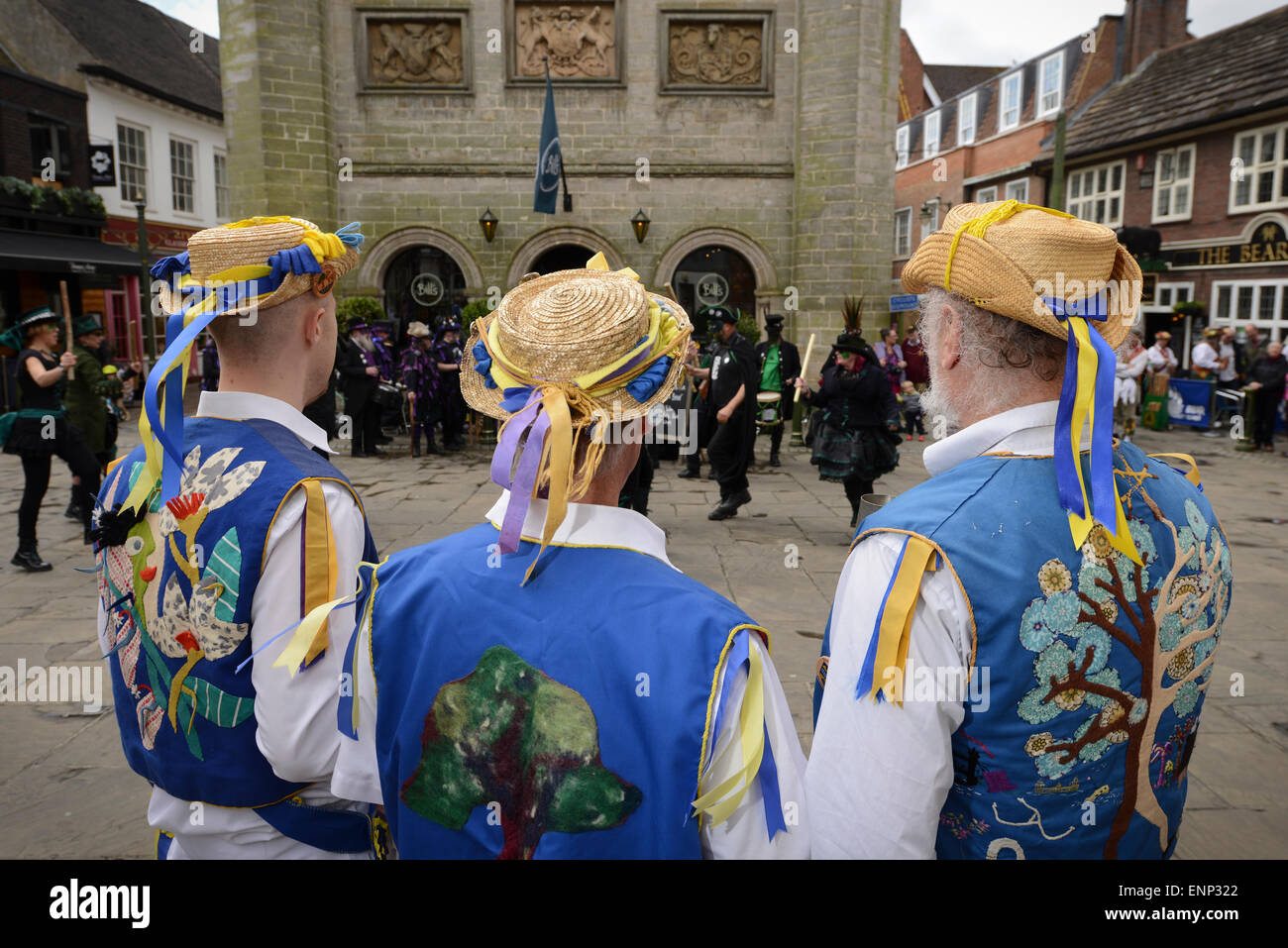 Members of the Thames Valley Morris Men side watch another Morris group ...