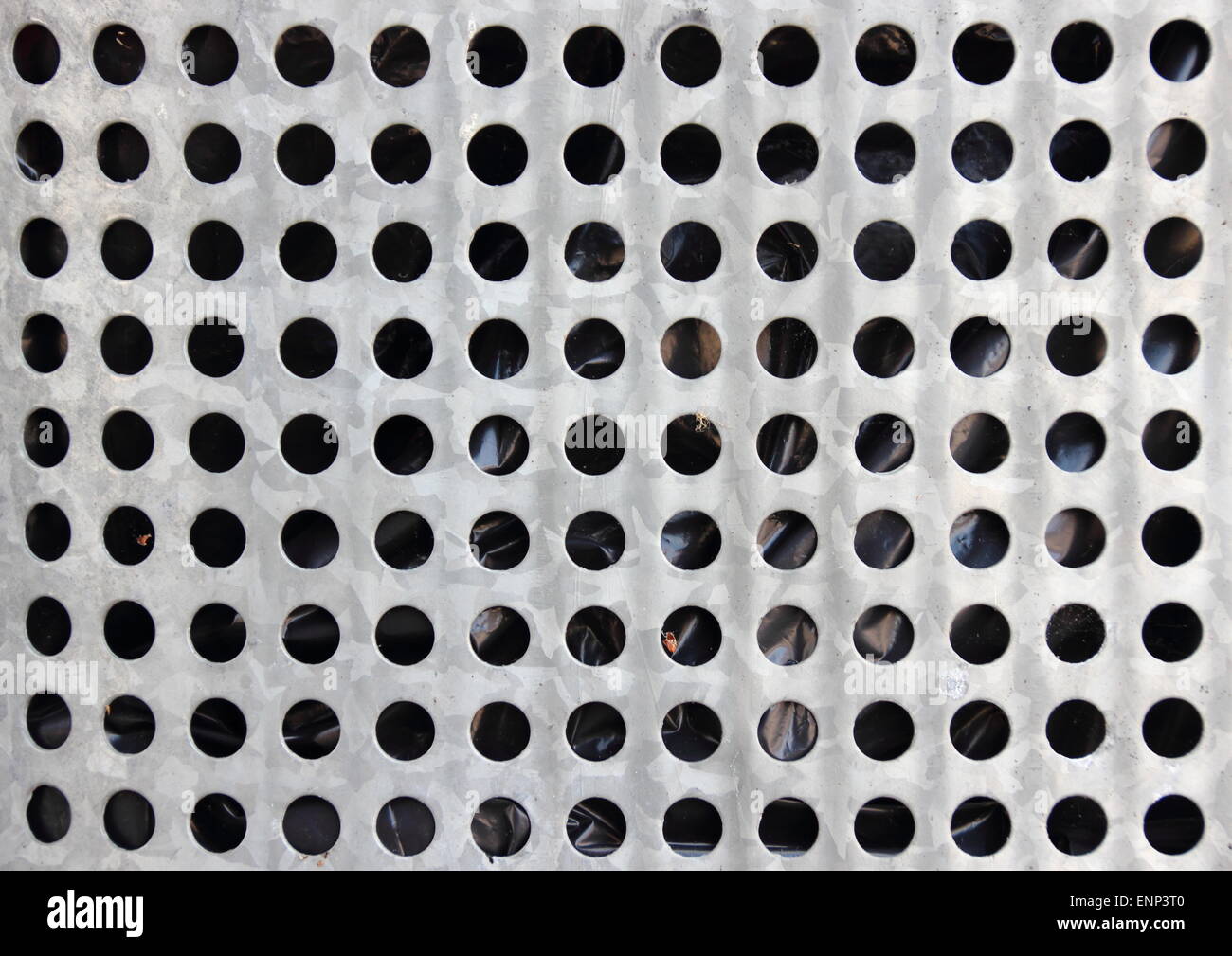 Closeup on steel barrel with black plastic inside Stock Photo - Alamy