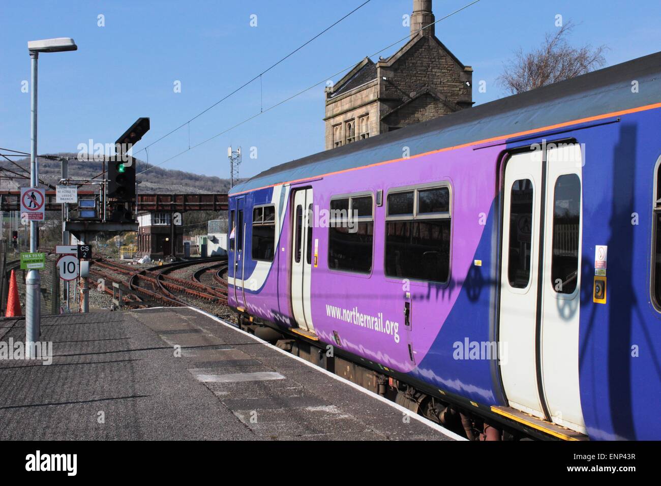 Class 150 diesel multiple unit in Northern livery leaving Carnforth ...