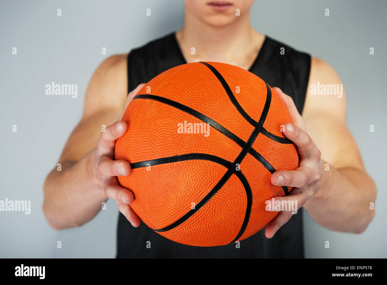 Close-up photo of ball in sportsman hands Stock Photo - Alamy