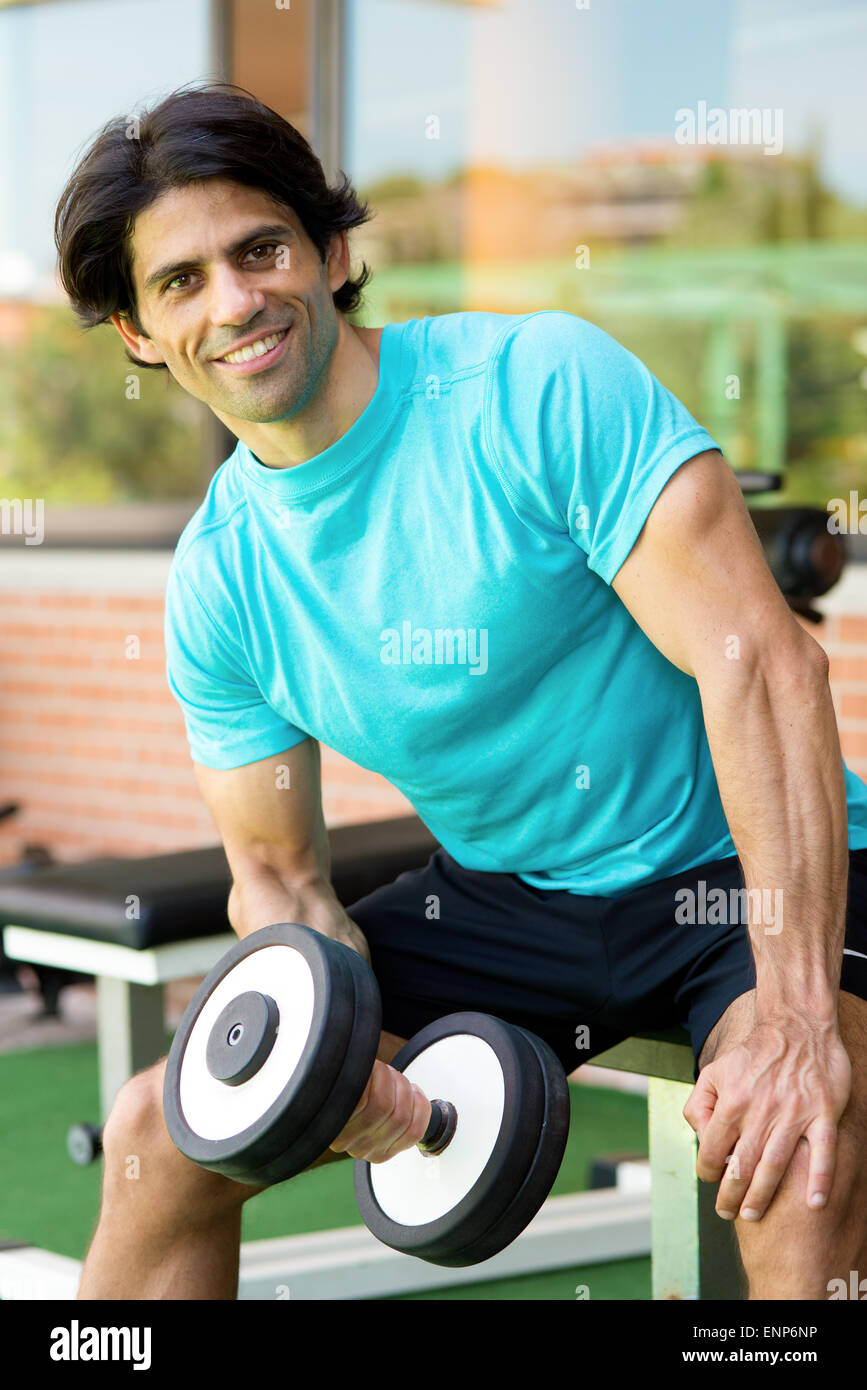 Strong guy doing hard exercises hi-res stock photography and images - Alamy