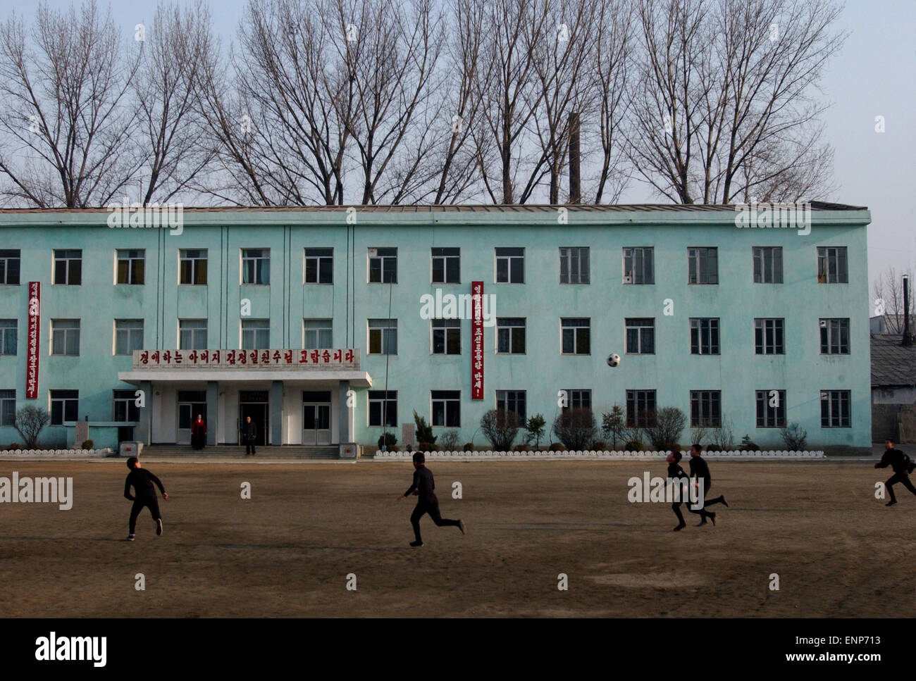 Boys playing football Kangan Primary school in Sonkyo District ...