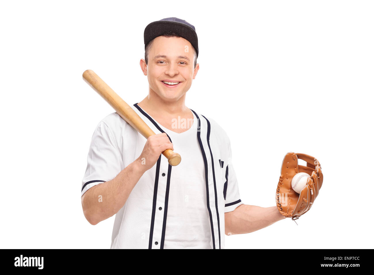 Young male baseball player holding a baseball bat and a ball isolated ...