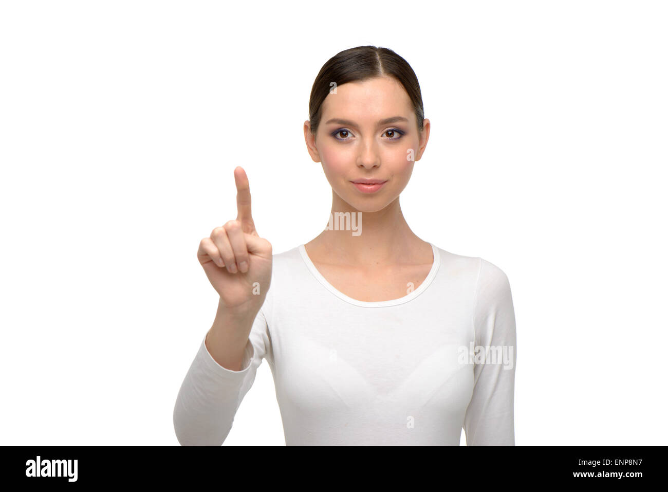 Beautiful woman looking and pointing at camera Stock Photo - Alamy