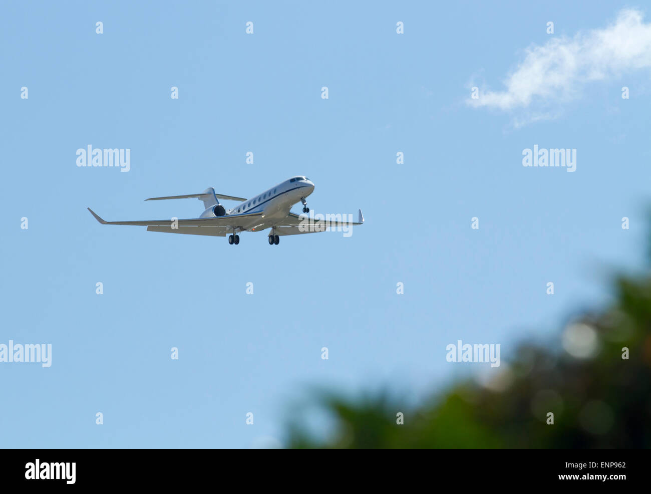 Private jet on a landing approach Stock Photo - Alamy