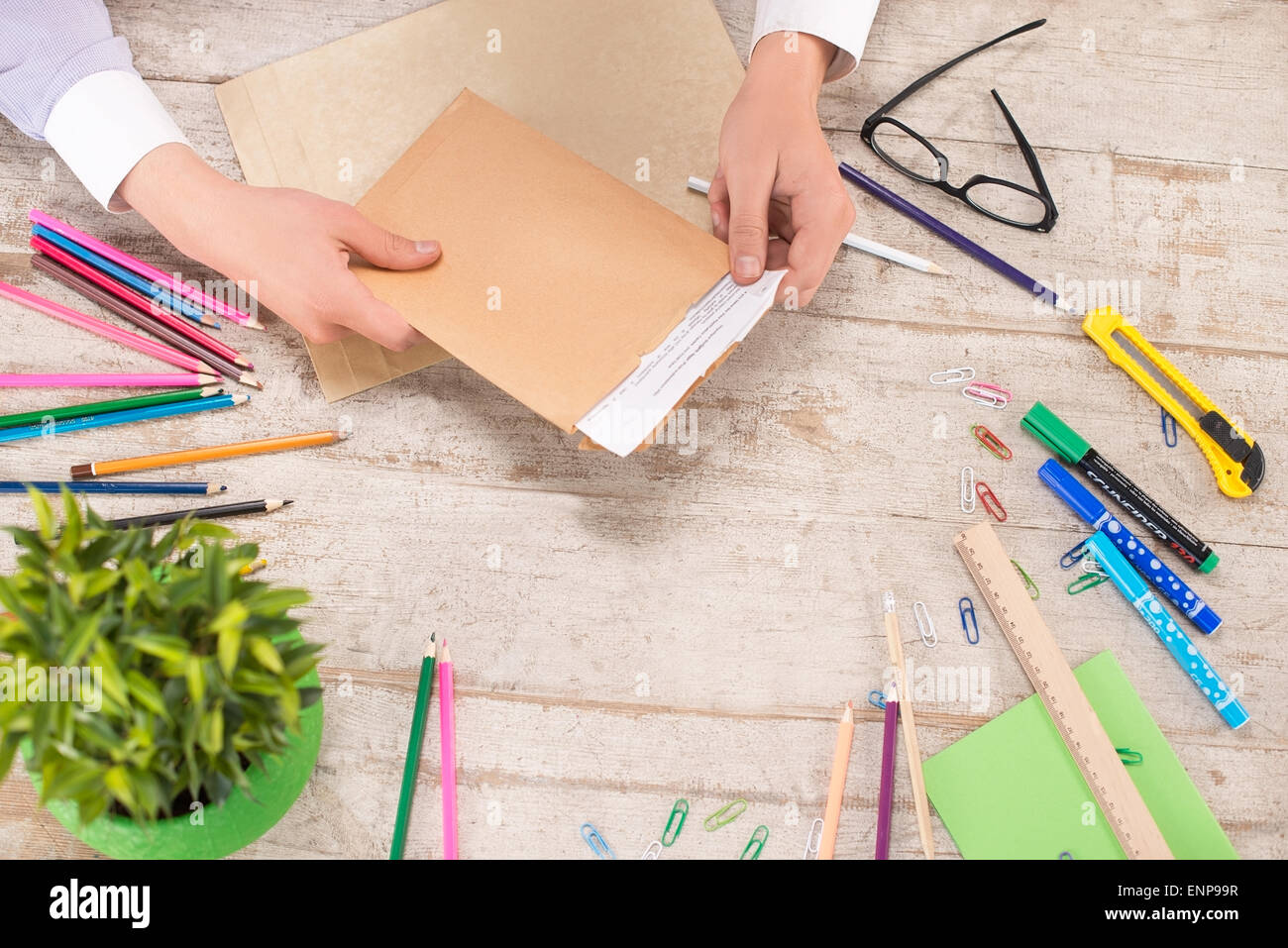 Nice top view photo of objects and man hands Stock Photo - Alamy