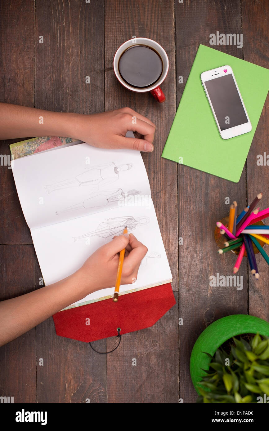 Nice top view photo of objects and woman hands Stock Photo - Alamy