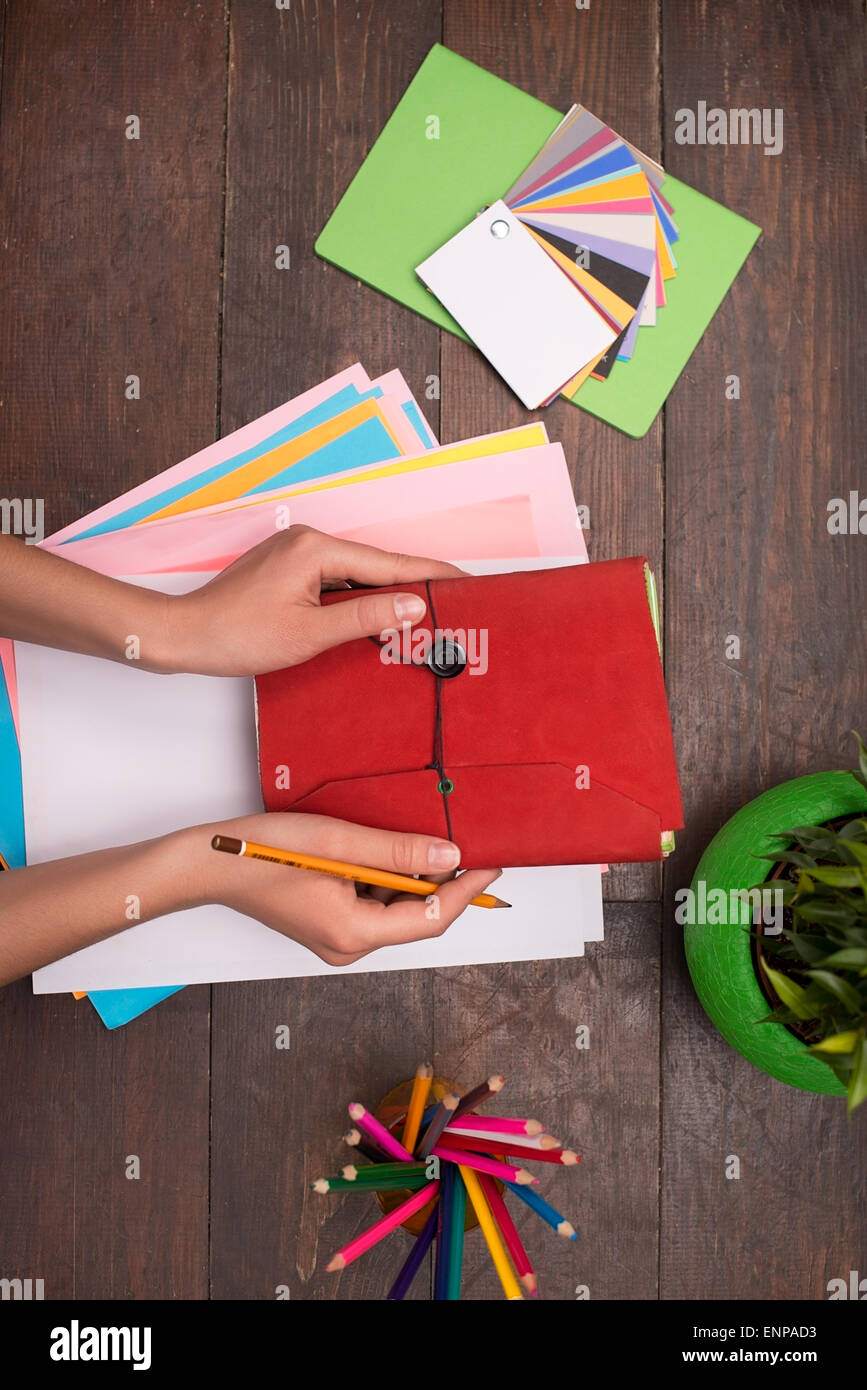 Nice top view photo of objects and woman hands Stock Photo - Alamy