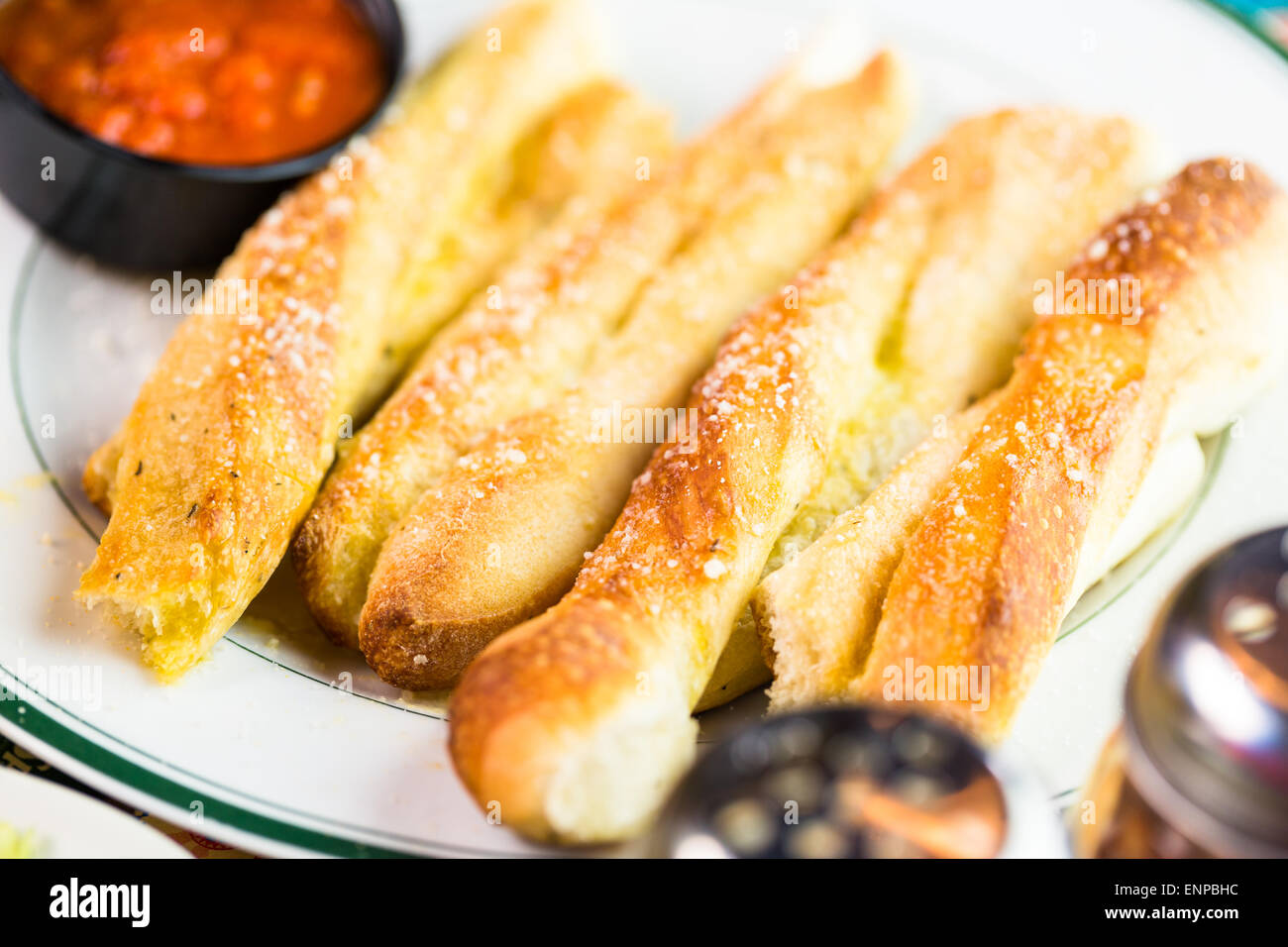 Fresh Italian garlic bread baked in restaurant Stock Photo - Alamy