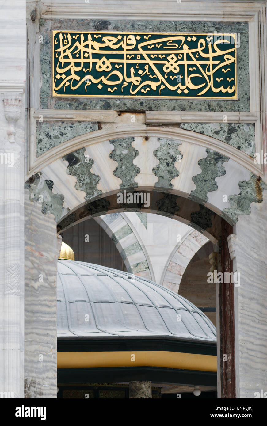 Doorway to an Istanbul mosque with arches and calligraphy Stock Photo ...
