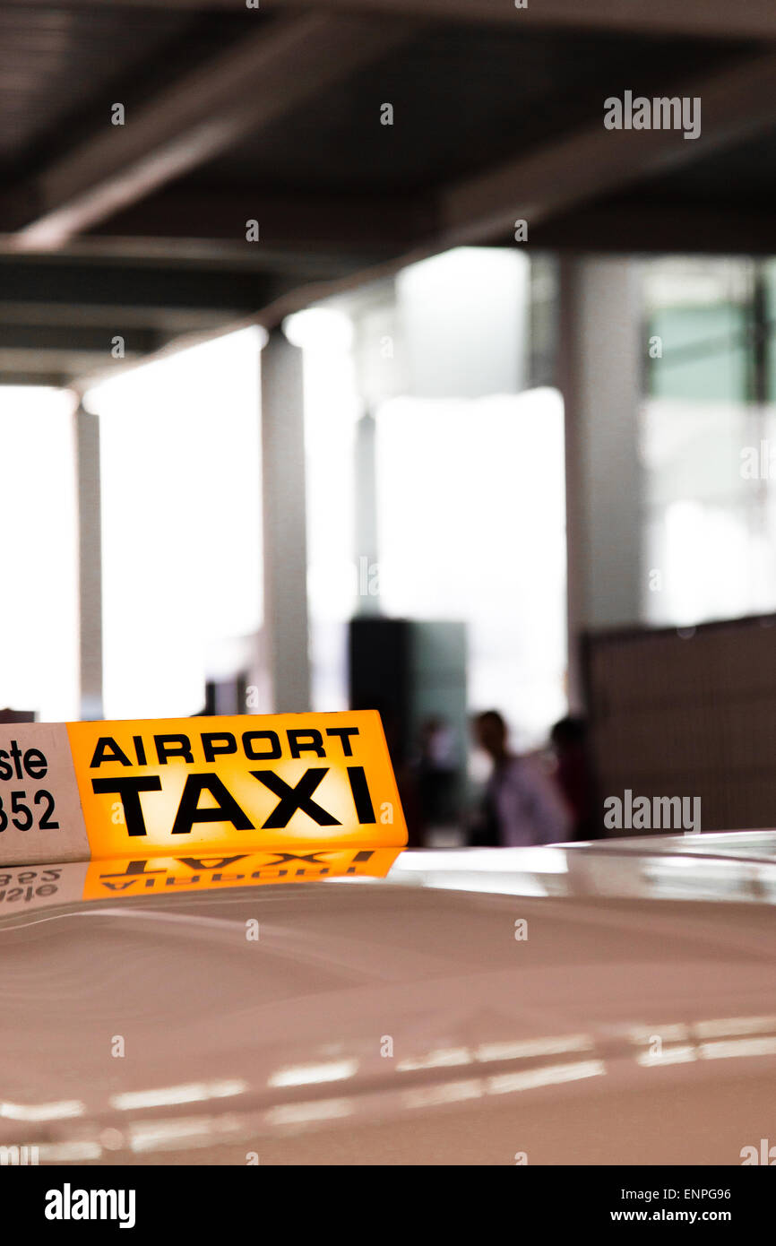 Taxi car waiting arrival passengers in front of Airport Gate Stock ...