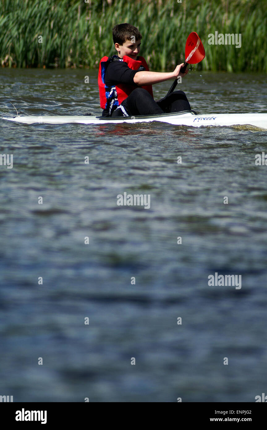 Boy competing in a K1 racing kayak Stock Photo - Alamy