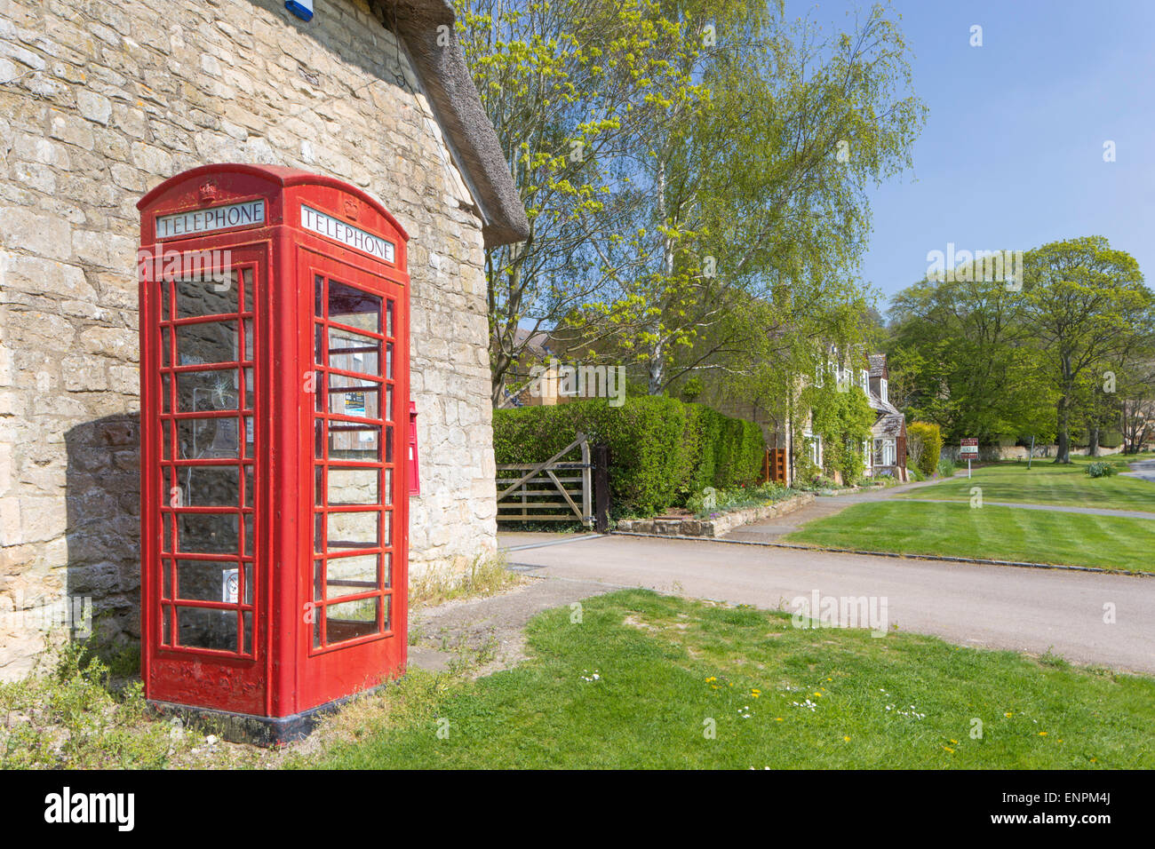Red telephone box village in village hi-res stock photography and ...