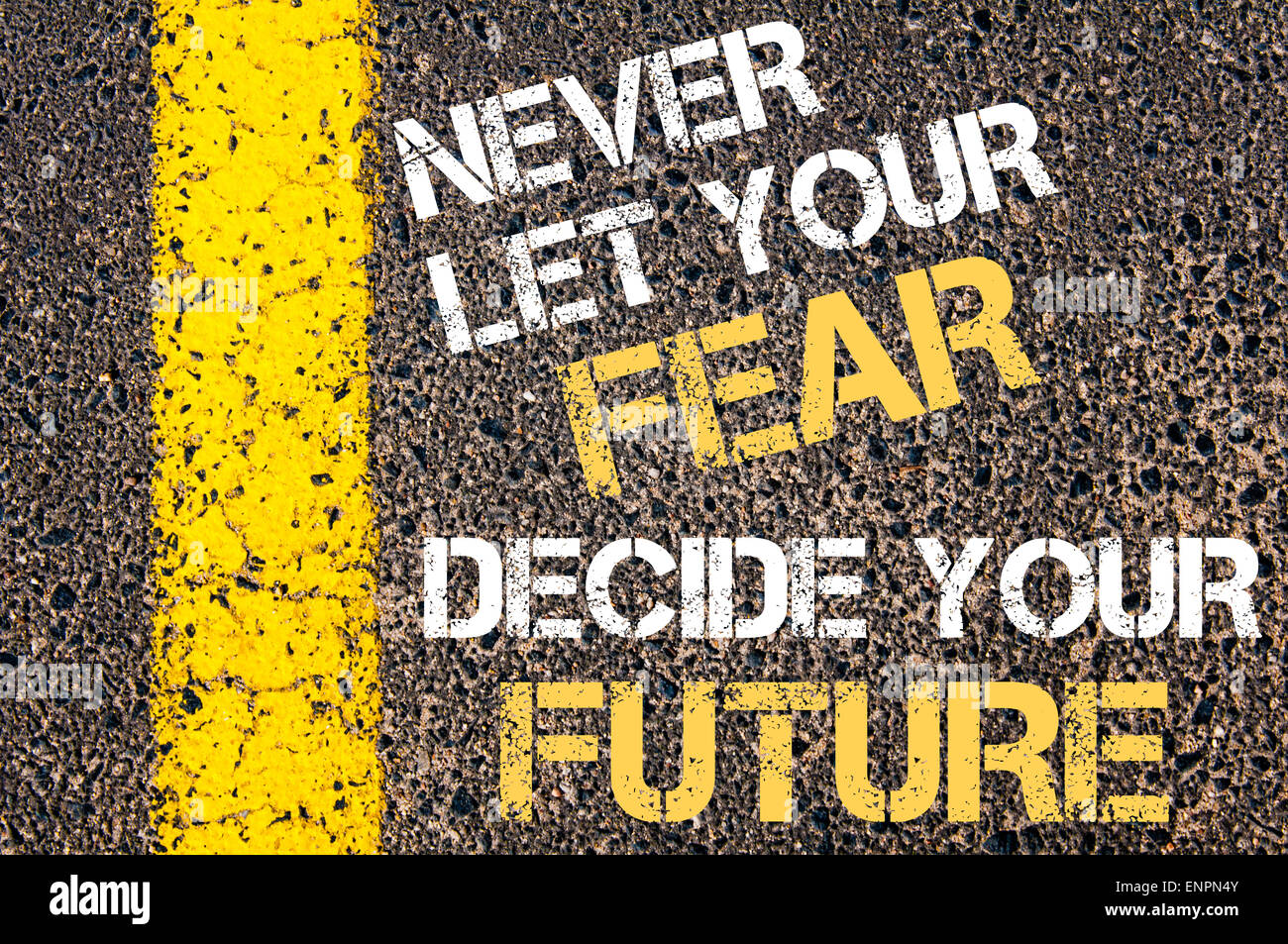 NEVER LET YOUR FEAR DECIDE YOUR FUTURE motivational quote. Yellow paint ...