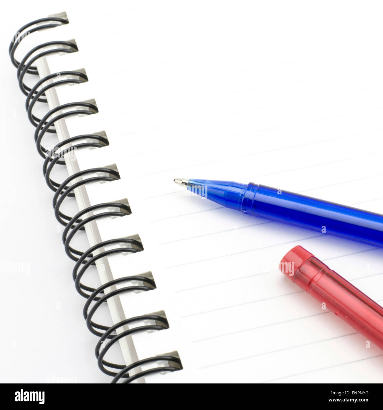 blue and red pen with notebook isolated on white background Stock Photo ...