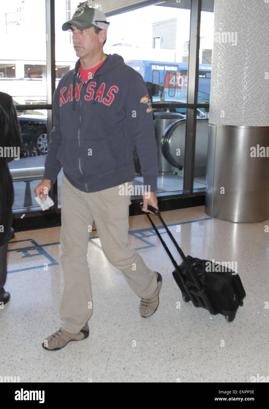 Rob Riggle departs Los Angeles International Airport (LAX) in Los ...