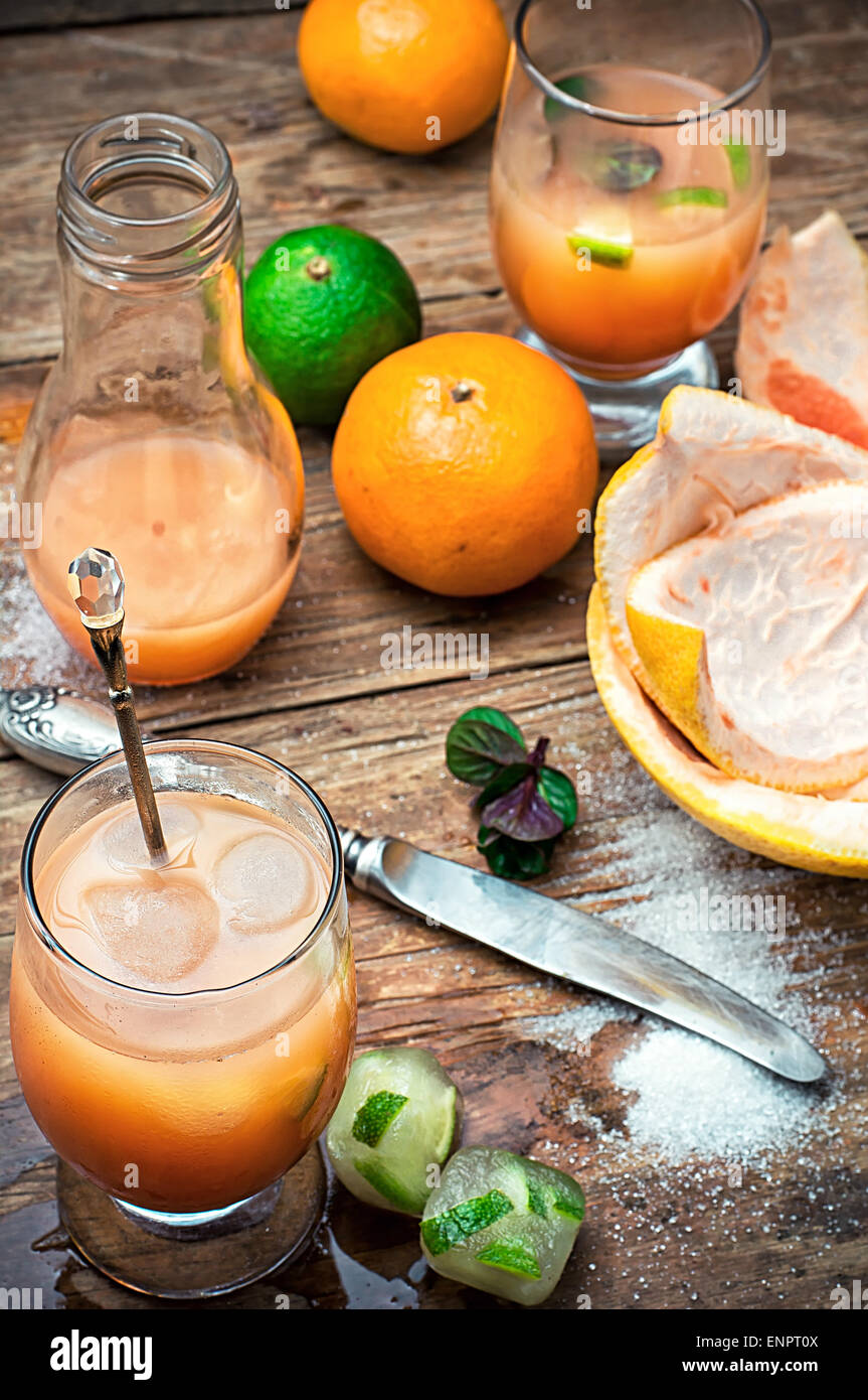 freshly squeezed citrus juice from oranges and tangerines.Selective ...