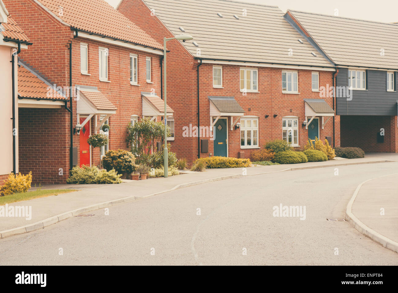 Row of Modern newly built housing development Stock Photo - Alamy