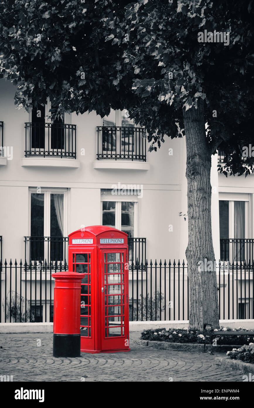 Red telephone booth and mail box in street in London as the famous ...