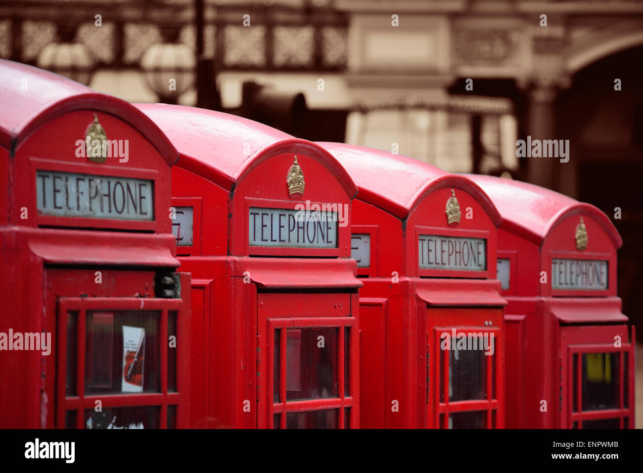 Red telephone box in street with historical architecture in London ...