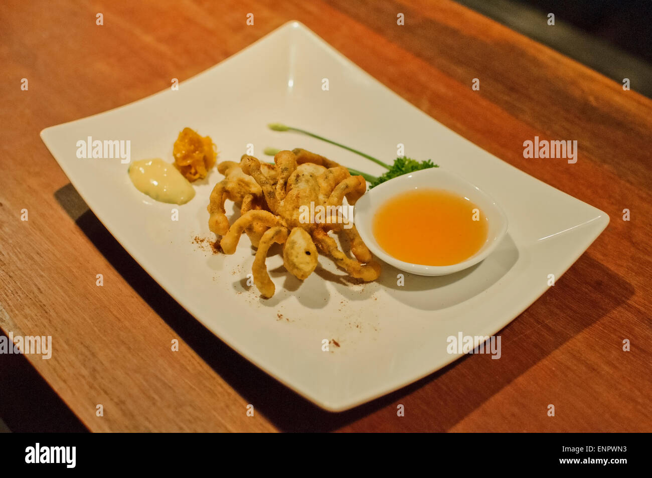 Fried Tarantula at Bugs Cafe in Siem Reap, Cambodia Stock Photo - Alamy