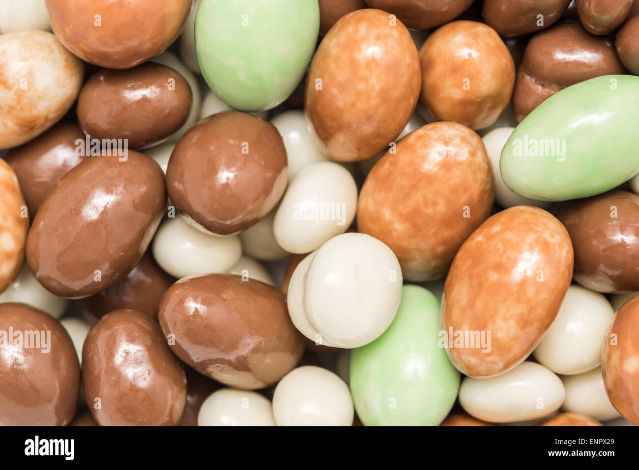 Assorted Milk Round Chocolate Sweets Background Stock Photo - Alamy