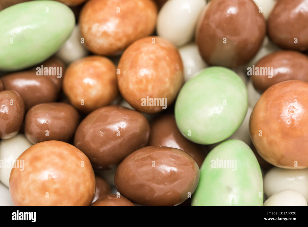 Assorted Milk Round Chocolate Sweets Background Stock Photo - Alamy