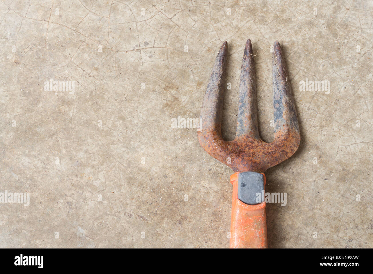 Rusty Old Fork Gardening Tool on Concrete Floor Background Stock Photo ...