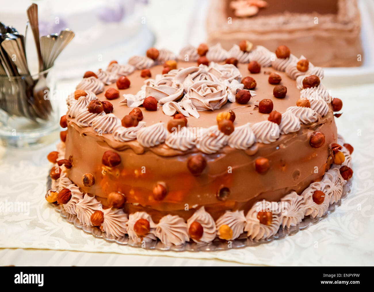 View at the white wedding cake Stock Photo - Alamy
