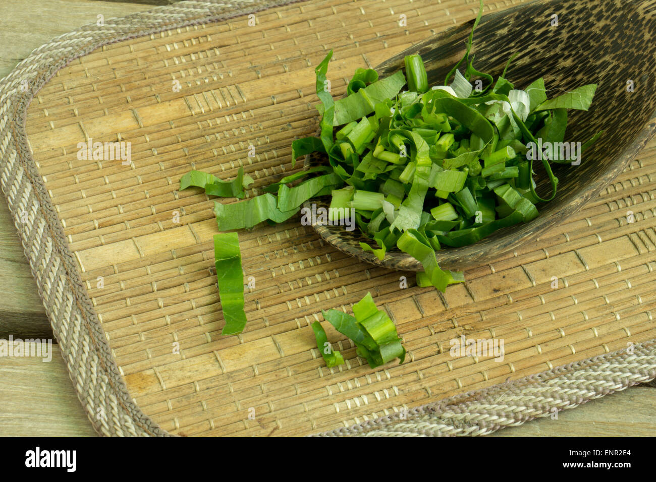 Wooden spoon chopped onion, minced fresh vegetables Stock Photo - Alamy