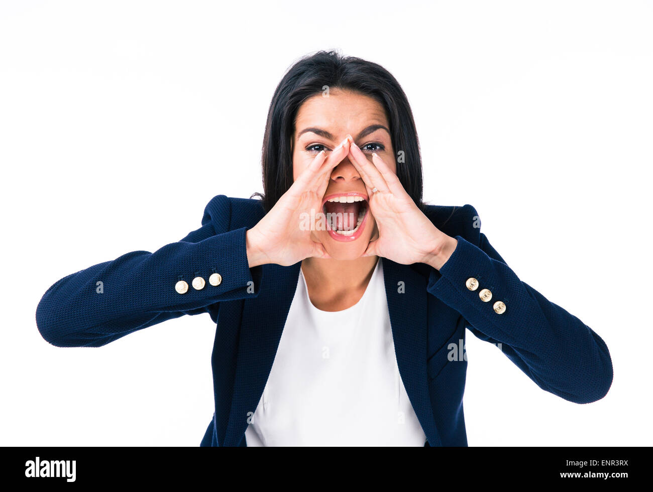 Angry businesswoman screaming over white background. Looking at camera ...