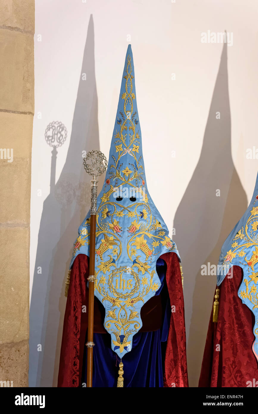 Penitent cloak, brotherhood Paso Azul in church San Francisco at Semana ...