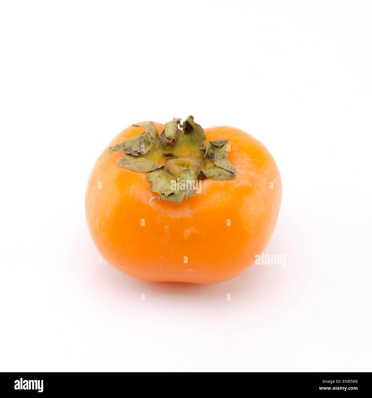 single persimmon isolated on white background Stock Photo - Alamy